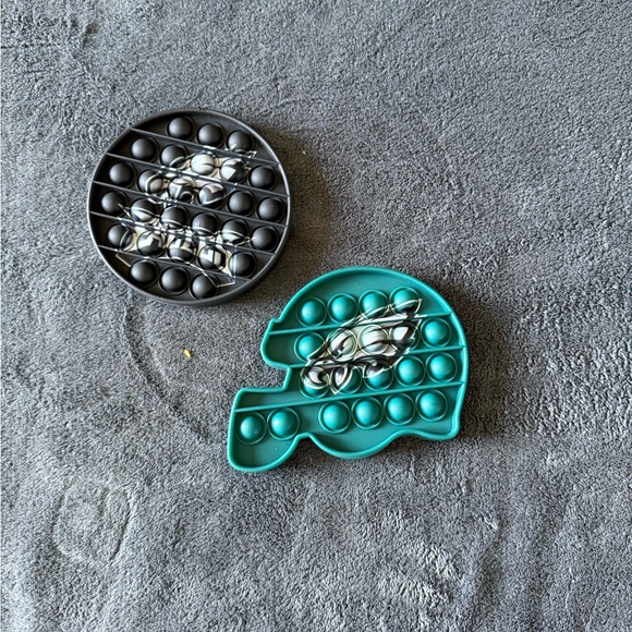 Toys | Teal And Black Eagles Pop It Fidget Toys | Poshmark